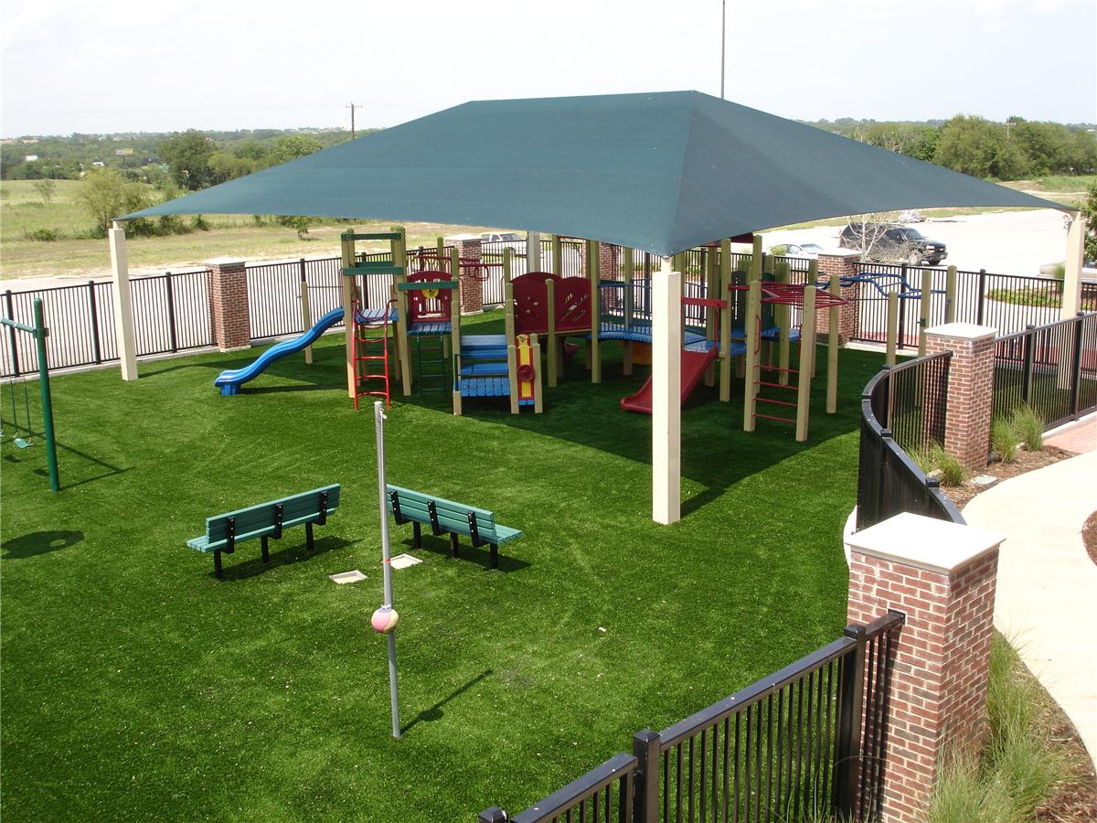 Hotel Playgrounds: Synthetic Grass Benefits & Installation